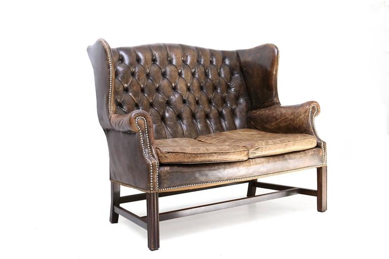 Chesterfield wingback tufted leather sofa at 1stDibs