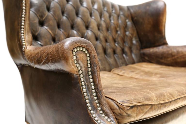 Chesterfield wingback tufted leather sofa at 1stDibs