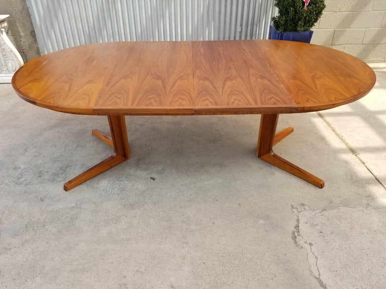 Round Teak Dining Table with Two Leaves at 1stDibs