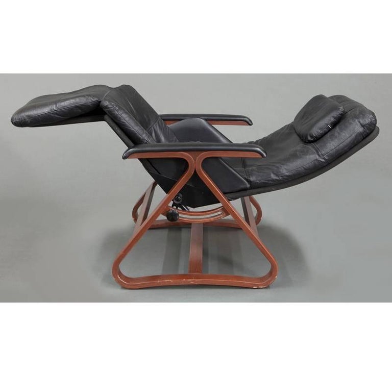 Contemporary Black Leather and Wood Reclining Armchair with Headrest at ...