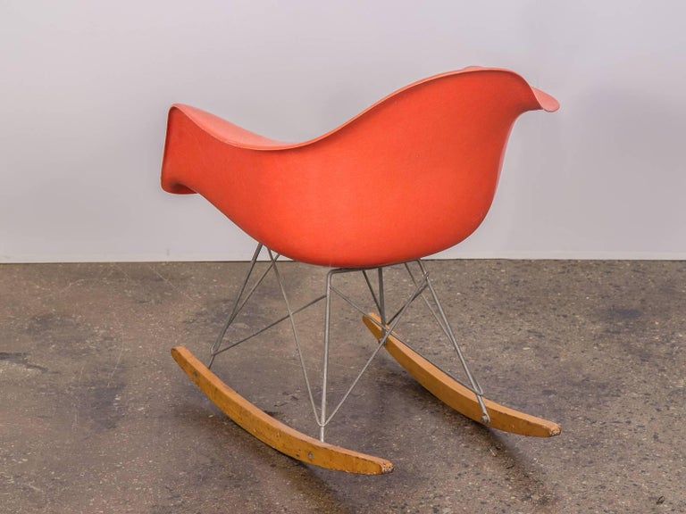 Eames Orange Armchair on Rocker Base For Sale at 1stDibs