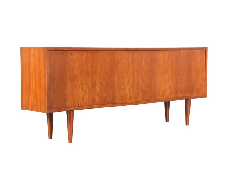 Danish Modern Low Profile Teak Bookcase with Sliding Glass Doors at 1stDibs