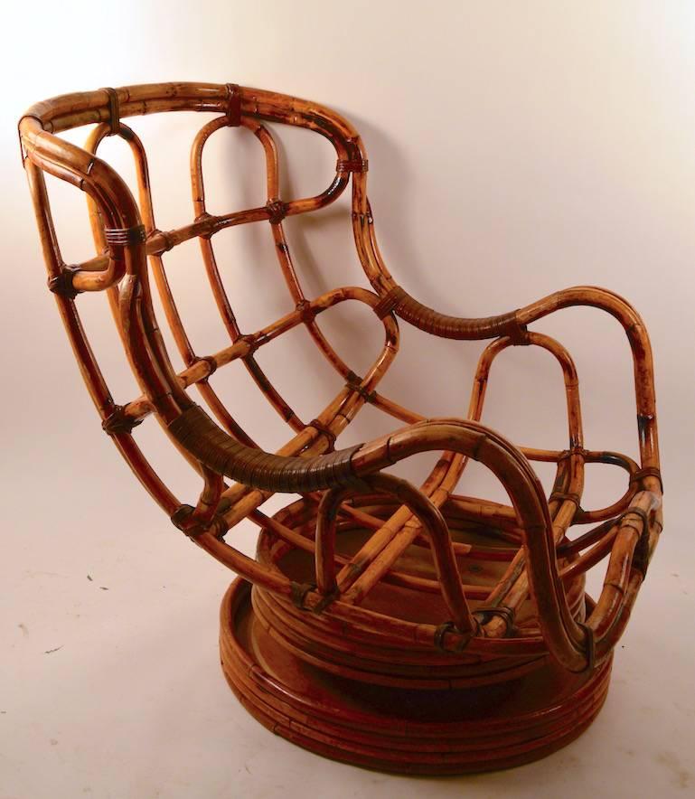 Pair of Swivel Tilt Bamboo Lounge Chairs at 1stDibs