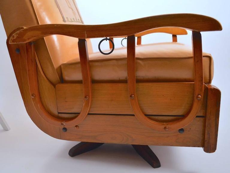 Cowboy Oak Swivel Tilt Rocking Lounge Chair at 1stDibs