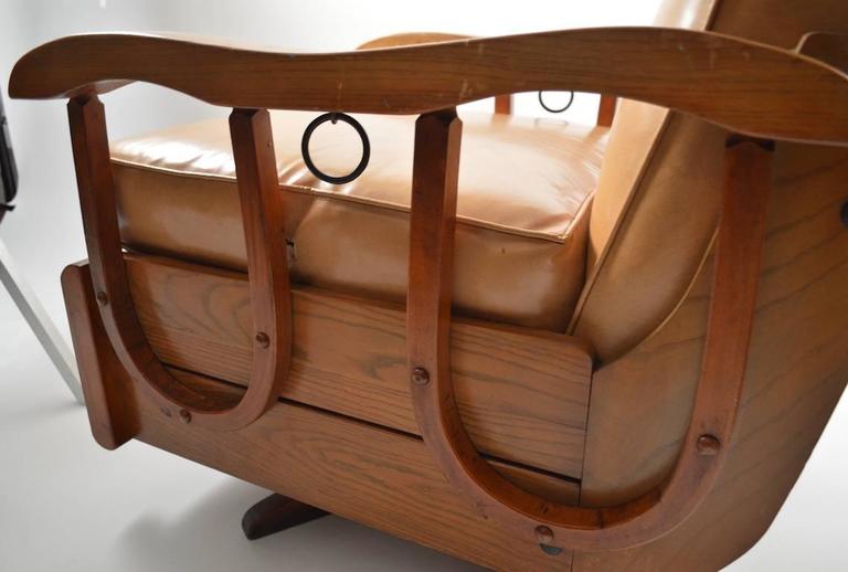 Cowboy Oak Swivel Tilt Rocking Lounge Chair at 1stDibs