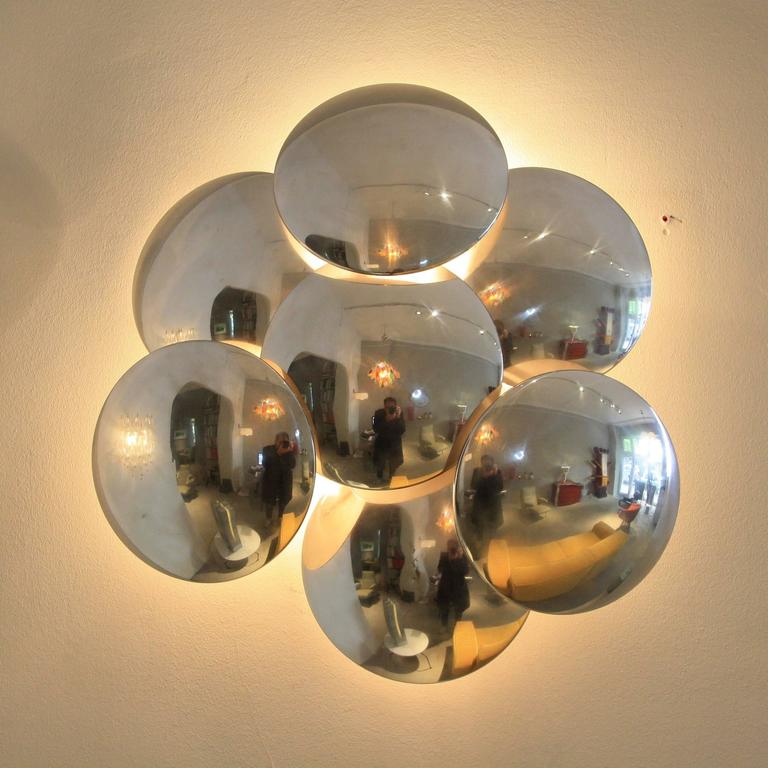 Seven Disks Reggiani Wall Sconce, Italy, 1970s at 1stDibs