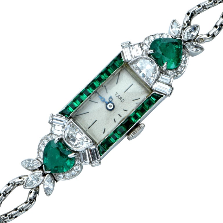 Raymond C. Yard platinum diamond Emerald wristwatch at 1stDibs
