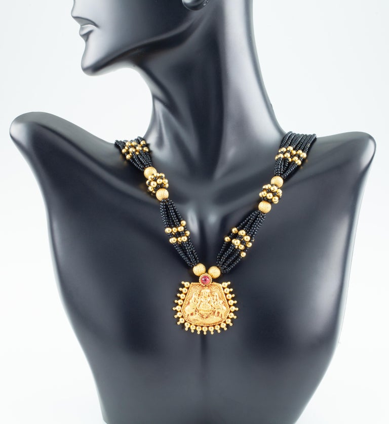 22 Karat KDM Yellow Gold Pendant with Gold and Black Bead Strands ...