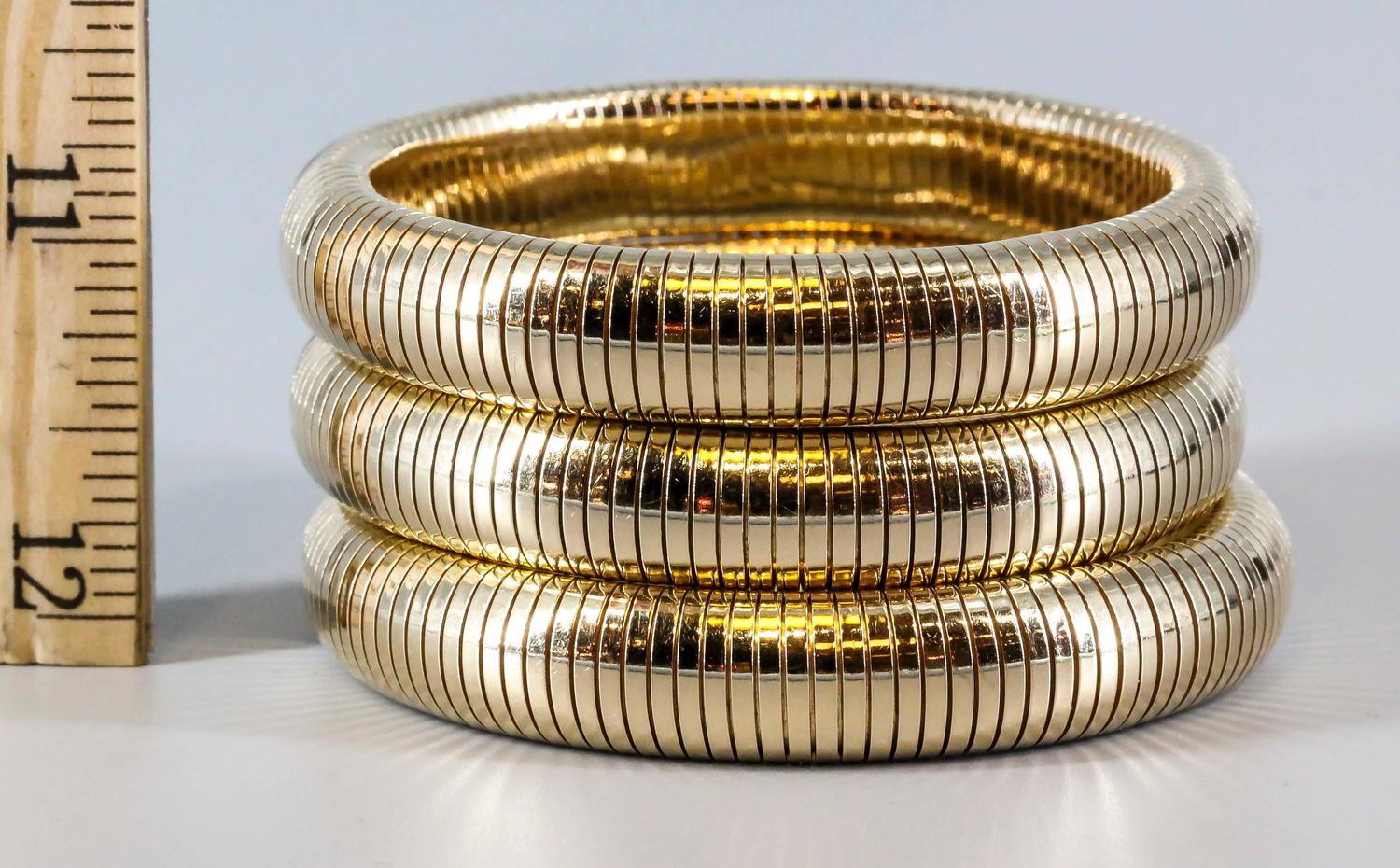 Forstner Trio of Gold Flexible Bangle Bracelets at 1stdibs
