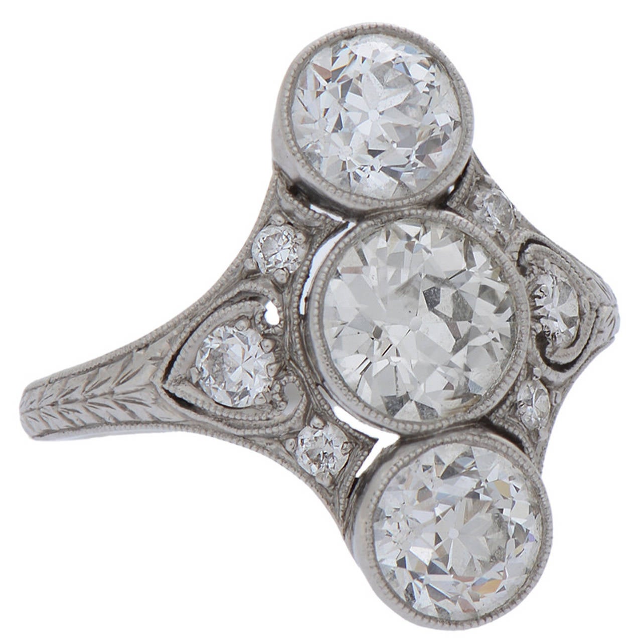 Edwardian Three-Stone Diamond and Platinum Dinner Ring at 1stDibs