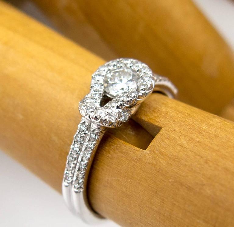 Elegant Diamond Platinum Mount Hercules Knot Ring For Sale at 1stDibs