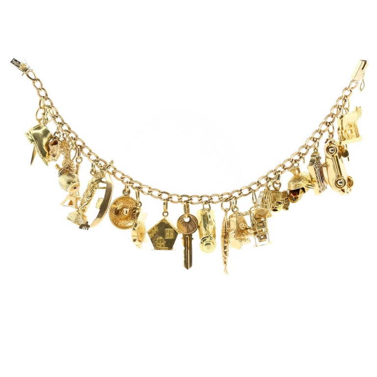 Vintage Charm Gold Bracelet at 1stDibs