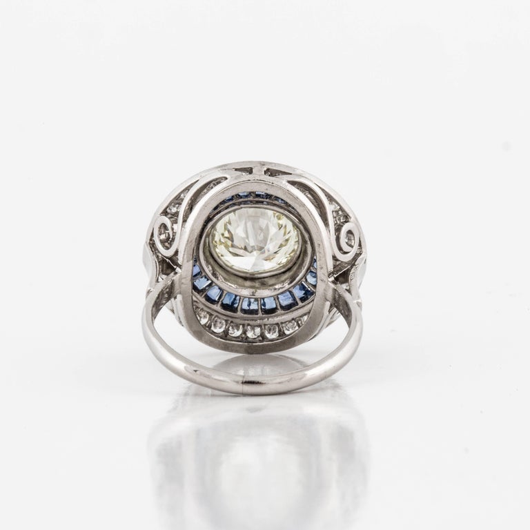 Contemporary Diamond and Sapphire Target Ring in Platinum For Sale at ...