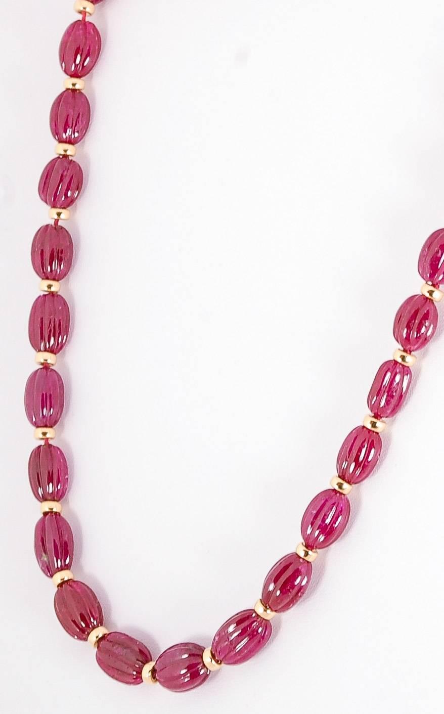 Carved ruby necklace at 1stDibs