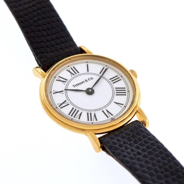 Chic Tiffany and Co. Roman Numeral Gold Wrist Watch at 1stDibs