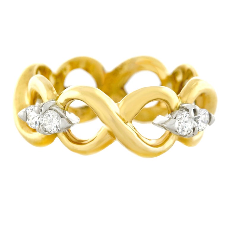 Tiffany and Co. Diamond Set Gold Infinity Ring at 1stDibs