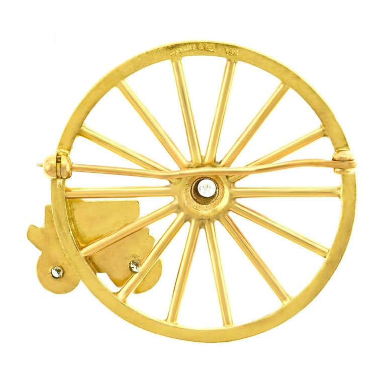 Tiffany and Co. Stagecoach Wheel Motif Gold Brooch For Sale at 1stDibs