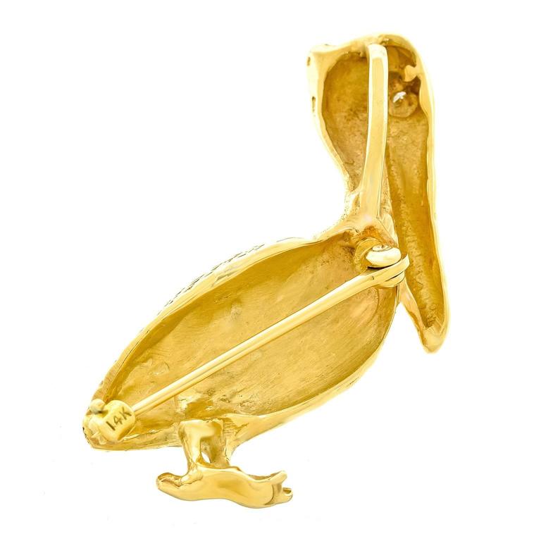 Charming Gold Pelican Brooch at 1stDibs