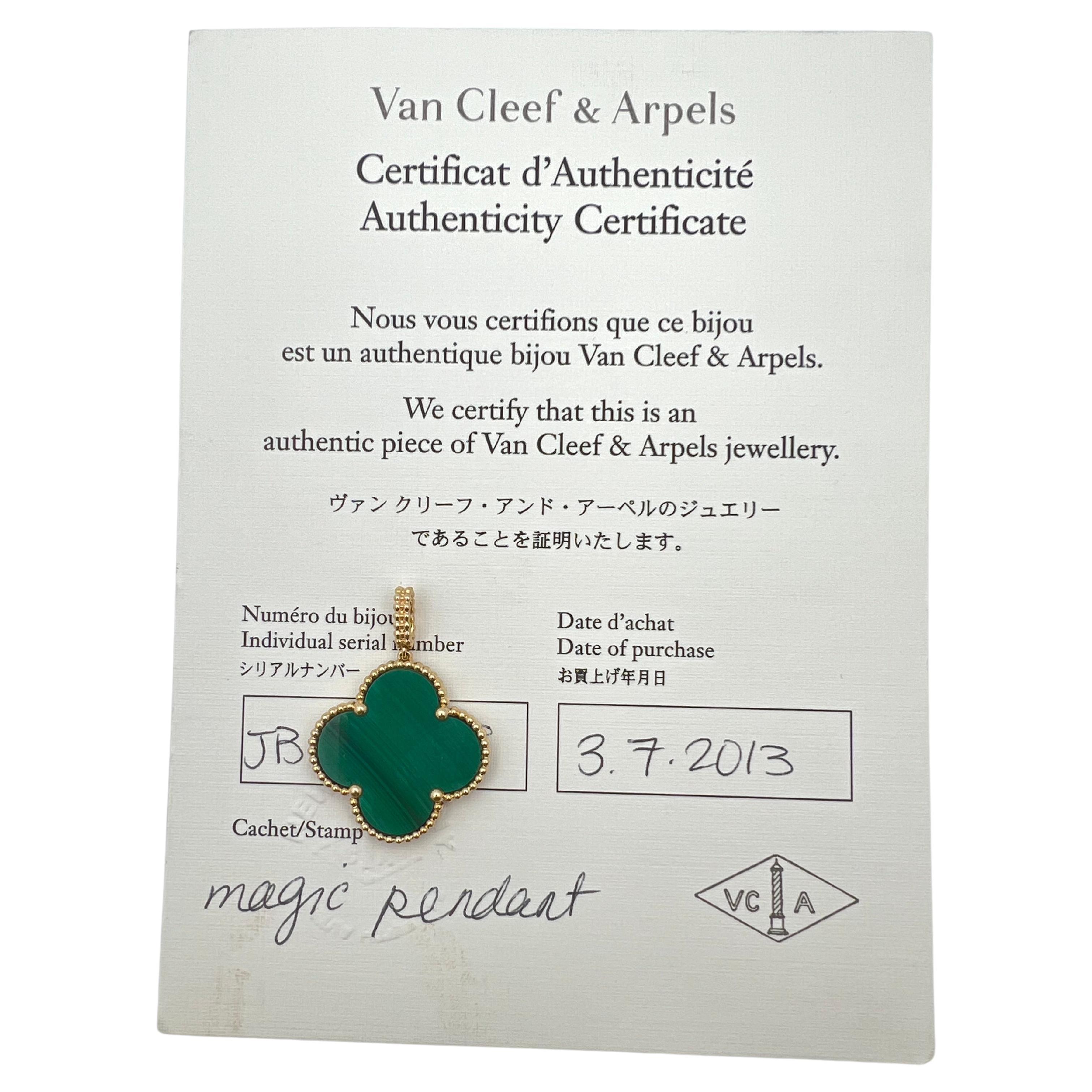 Van Cleef and Arpels 18k Gold Malachite Magic Alhambra Pendant For Sale ...
