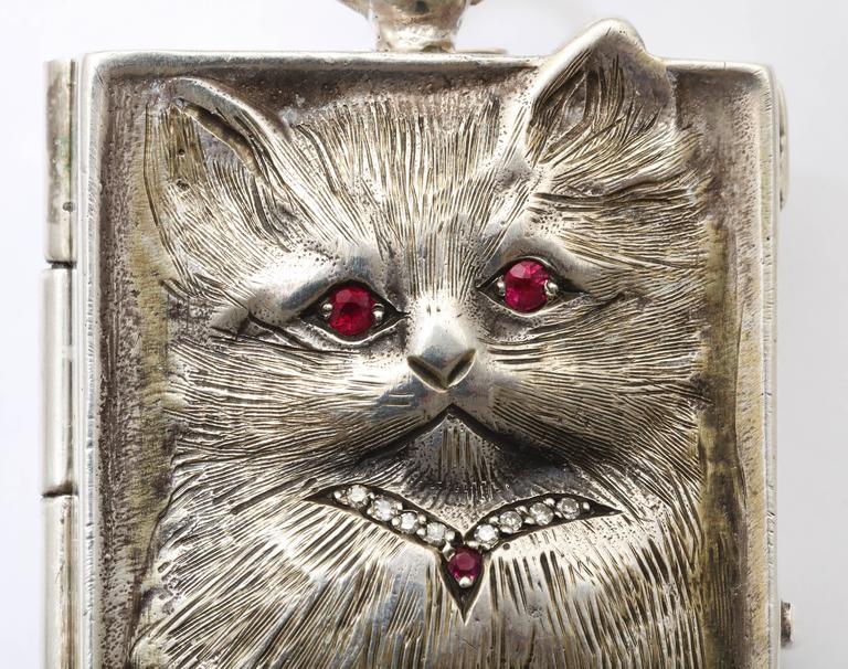 Silver Pendant of a Cuddlesome Kitty with Ruby Eyes at 1stDibs