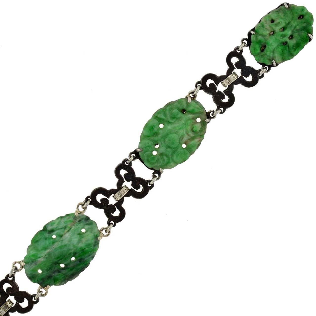 Marsh and Company Art Deco Carved Jadeite Steel Link Bracelet at 1stDibs