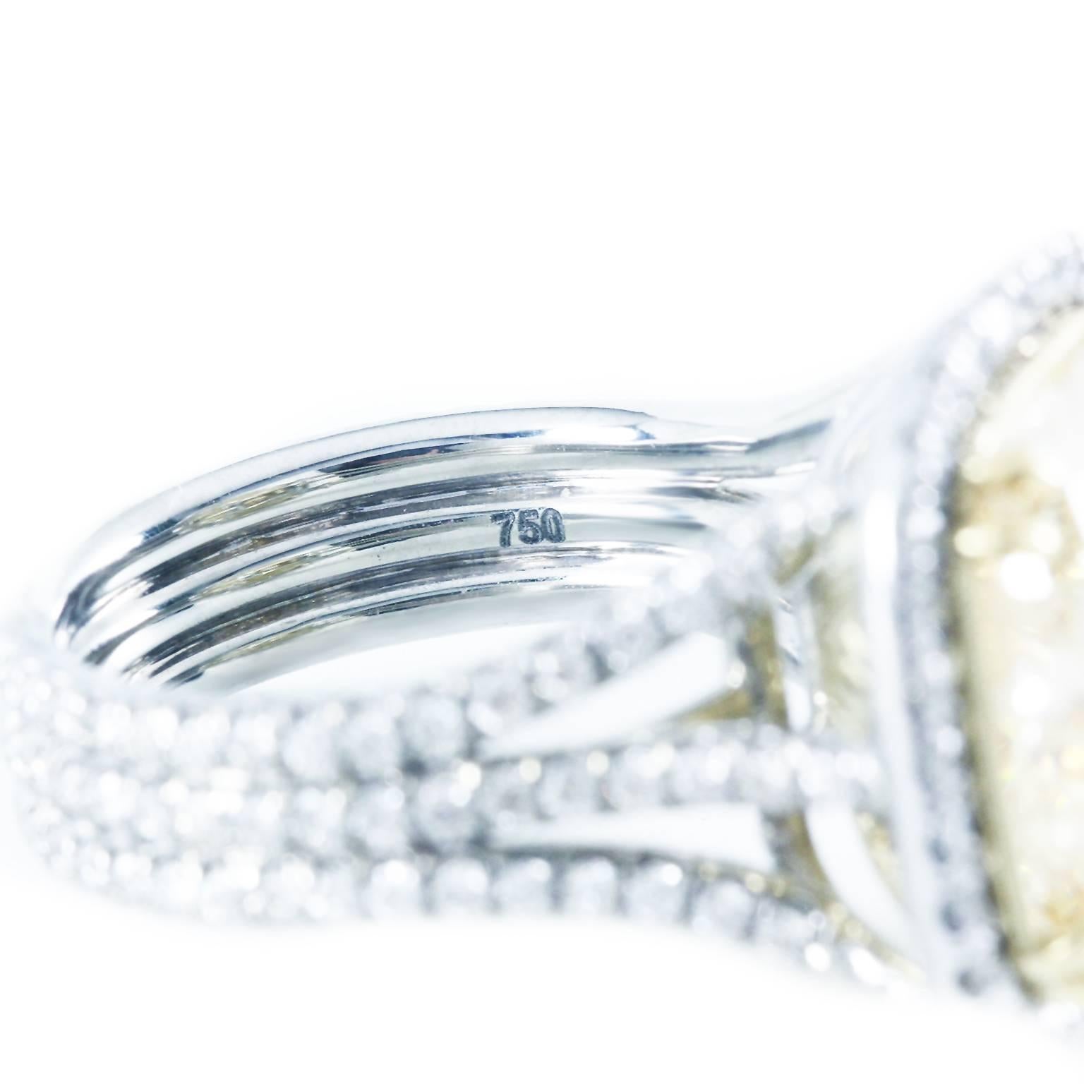 11.58 Carat GIA Cushion Fancy Light Yellow Diamond Gold Halo Engagement Ring For Sale at 1stDibs