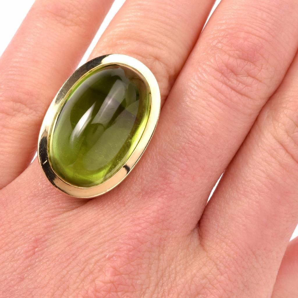 Large 38.24 carat Peridot Oval Cabochon Gold Ring at 1stdibs