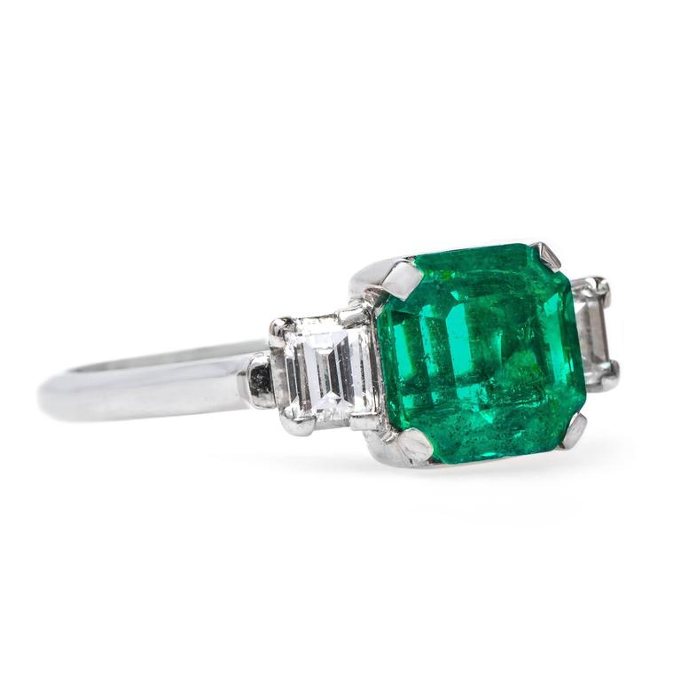 Bold Modern Era Emerald Ring with Square Step Cut Diamonds at 1stDibs