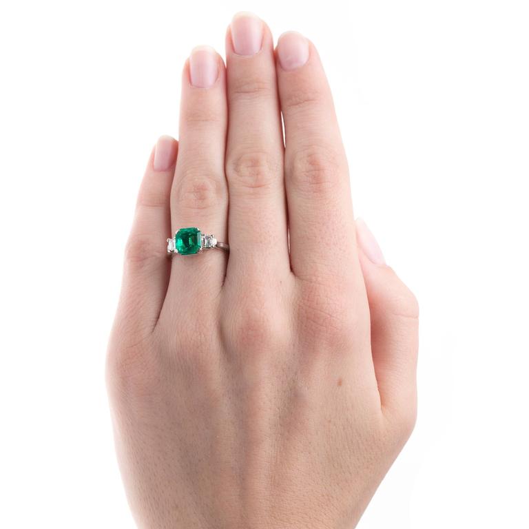 Bold Modern Era Emerald Ring with Square Step Cut Diamonds at 1stDibs