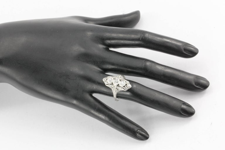Art Deco Platinum and Diamond Three-Stone Shield Ring at 1stDibs