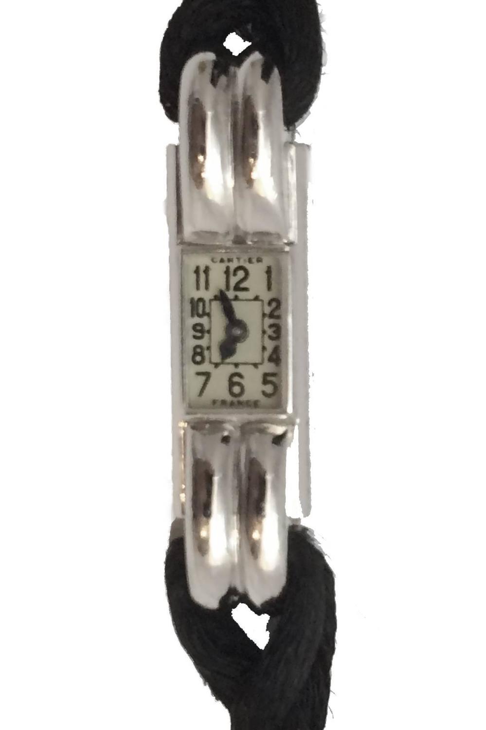 "The smallest watch in the world" from Cartier. For Sale at 1stdibs