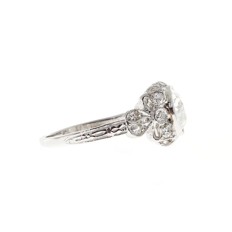 Edwardian Diamond Platinum Bow Design Engagement Ring at 1stDibs
