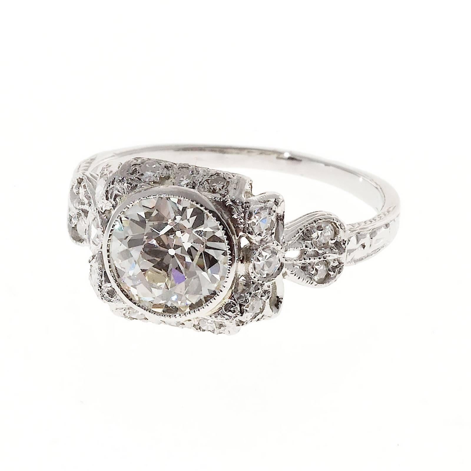Edwardian Diamond Platinum Bow Design Engagement Ring at 1stDibs