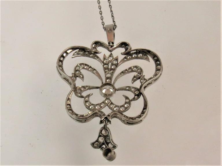 Diamond Platinum Pendant Suspended from a Platinum Chain For Sale at ...