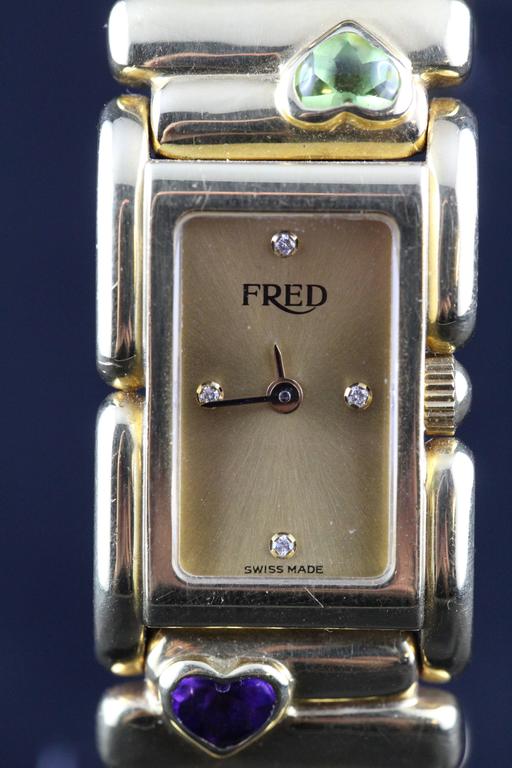 Fred Lady Wristwatch in Gold and Semi Precious Stones, circa 1990 For ...