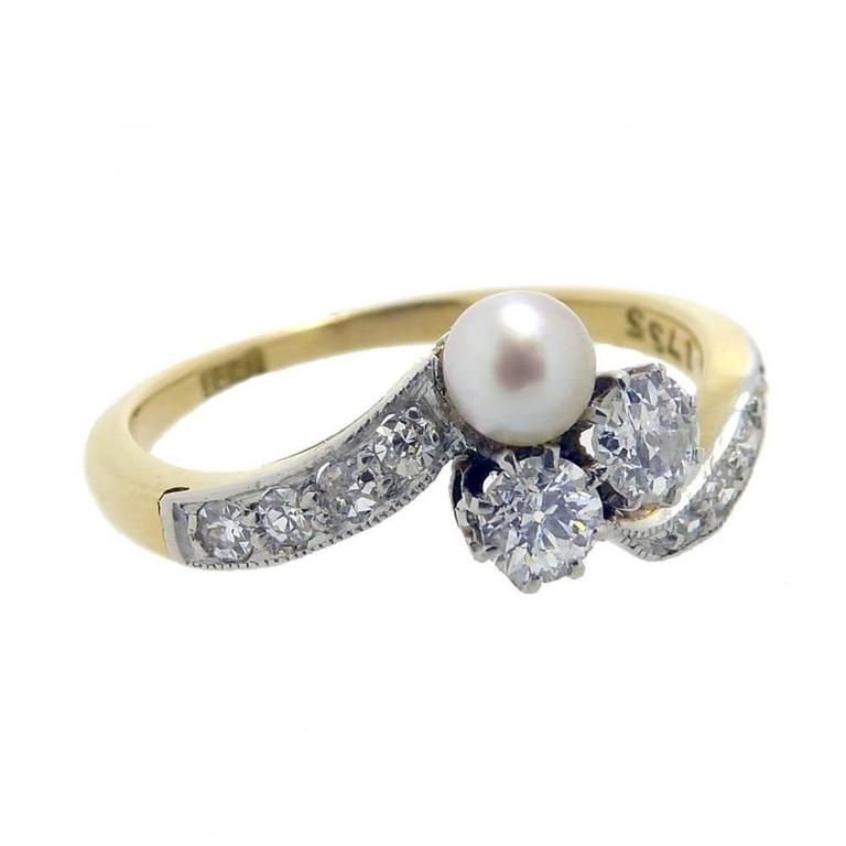 1920s Diamond Pearl Cross over Twist Ring, Diamond Shoulders at 1stDibs