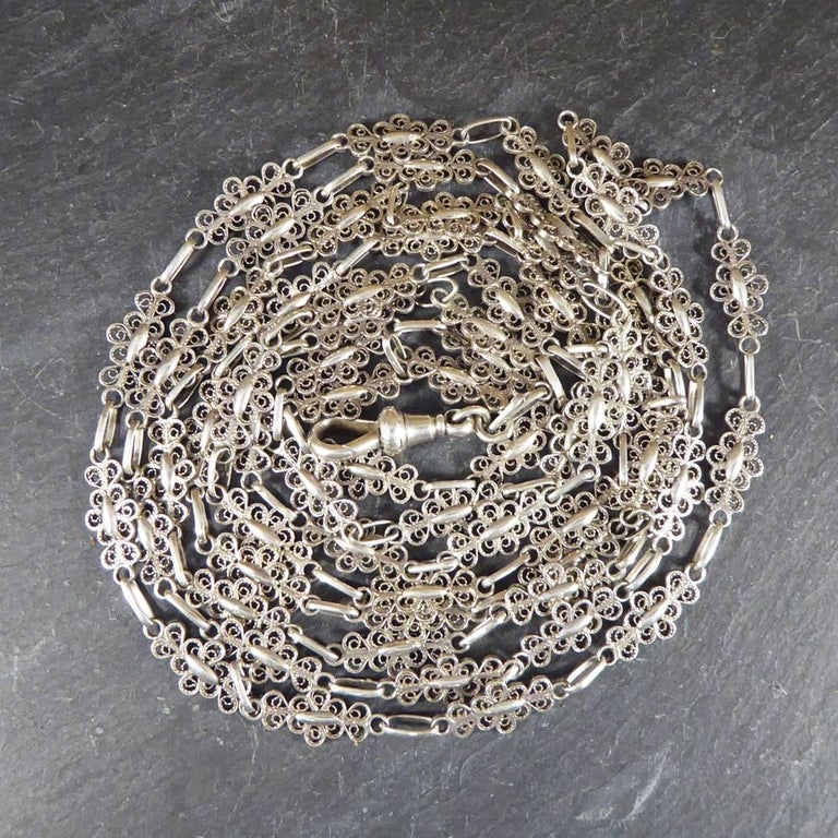 Late Victorian Long Silver Guard Chain with Decorative Links at 1stDibs
