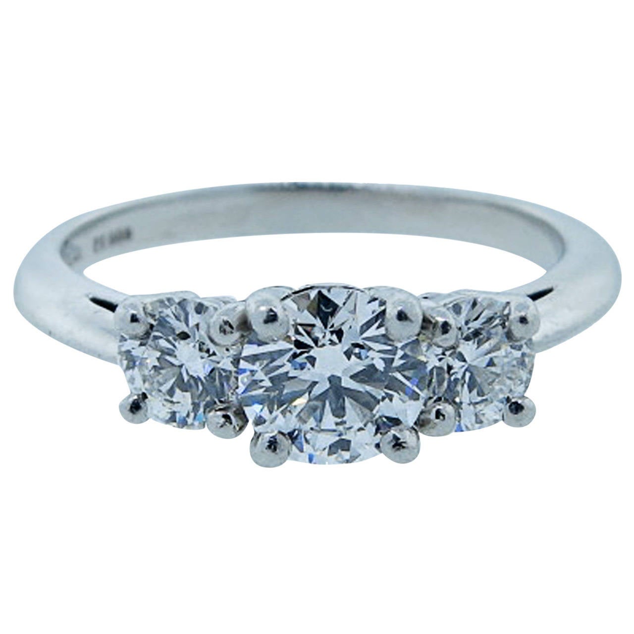 Tiffany and Co. Classic Three Stone Diamond Platinum Engagement Ring at 1stDibs