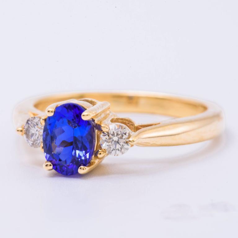 Oval Tanzanite Diamond Gold Three-Stone Engagement Ring For Sale at 1stDibs