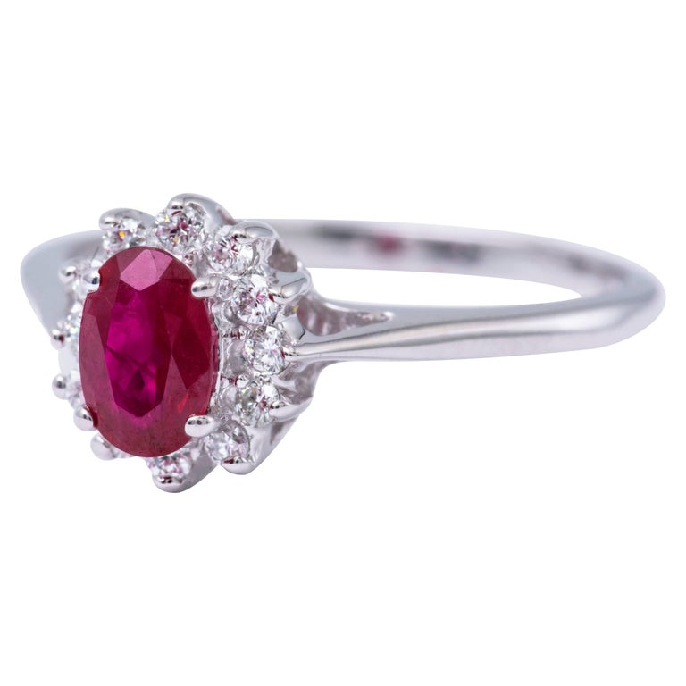 Oval Ruby and Diamonds Halo Ring For Sale at 1stDibs