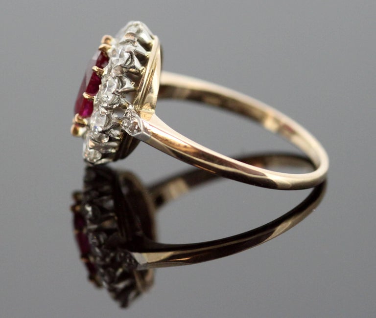 18 Karat Yellow Gold Oval Ruby Diamond Cluster Ring, circa 1970s at 1stDibs