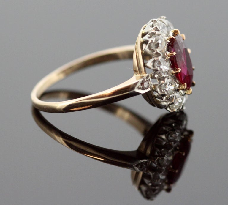 18 Karat Yellow Gold Oval Ruby Diamond Cluster Ring, circa 1970s at 1stDibs