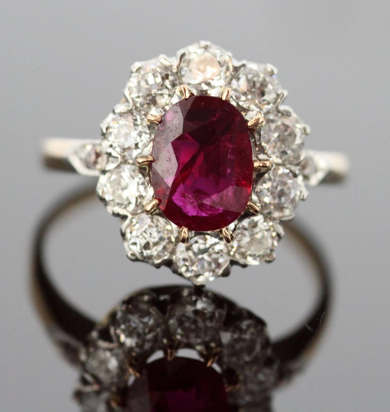 18 Karat Yellow Gold Oval Ruby Diamond Cluster Ring, circa 1970s at 1stDibs