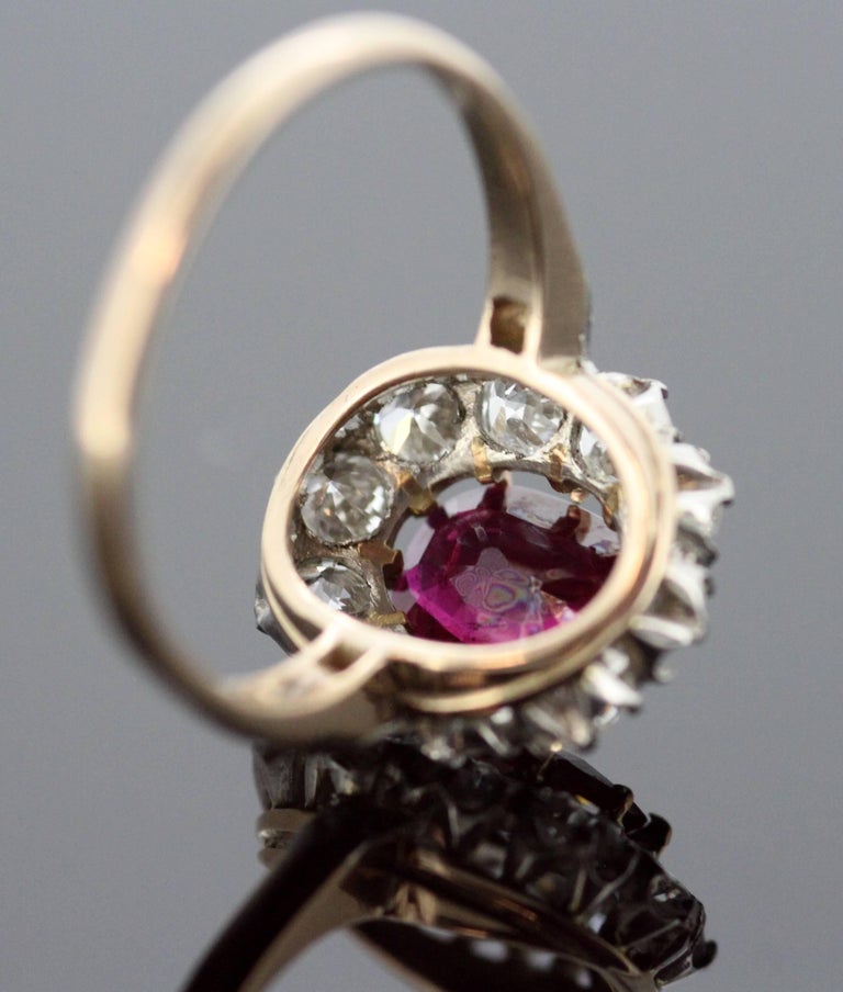 18 Karat Yellow Gold Oval Ruby Diamond Cluster Ring, circa 1970s at 1stDibs