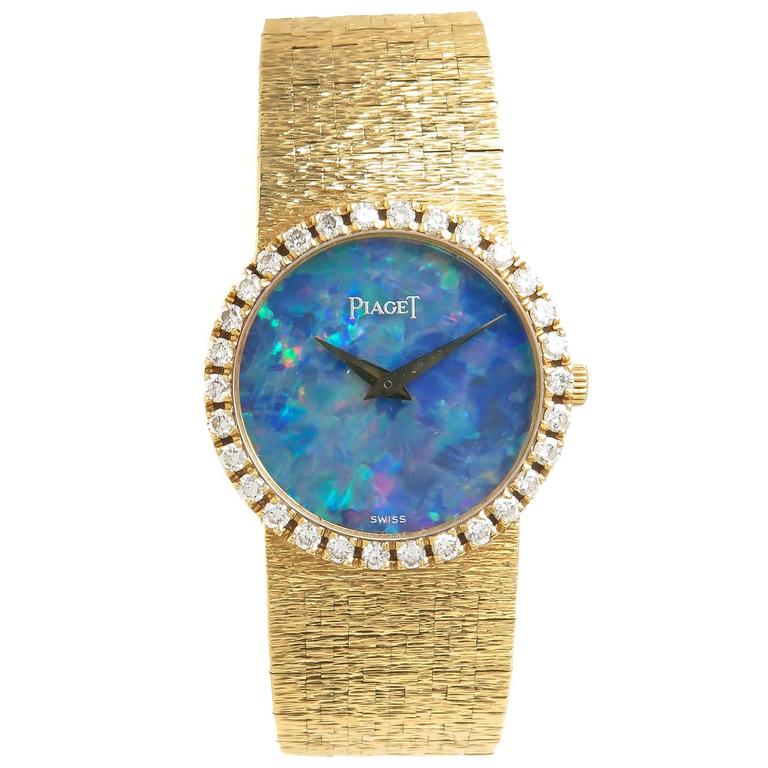 Piaget Yellow Gold Diamond Opal Quartz Wristwatch, circa 1970s at 1stDibs