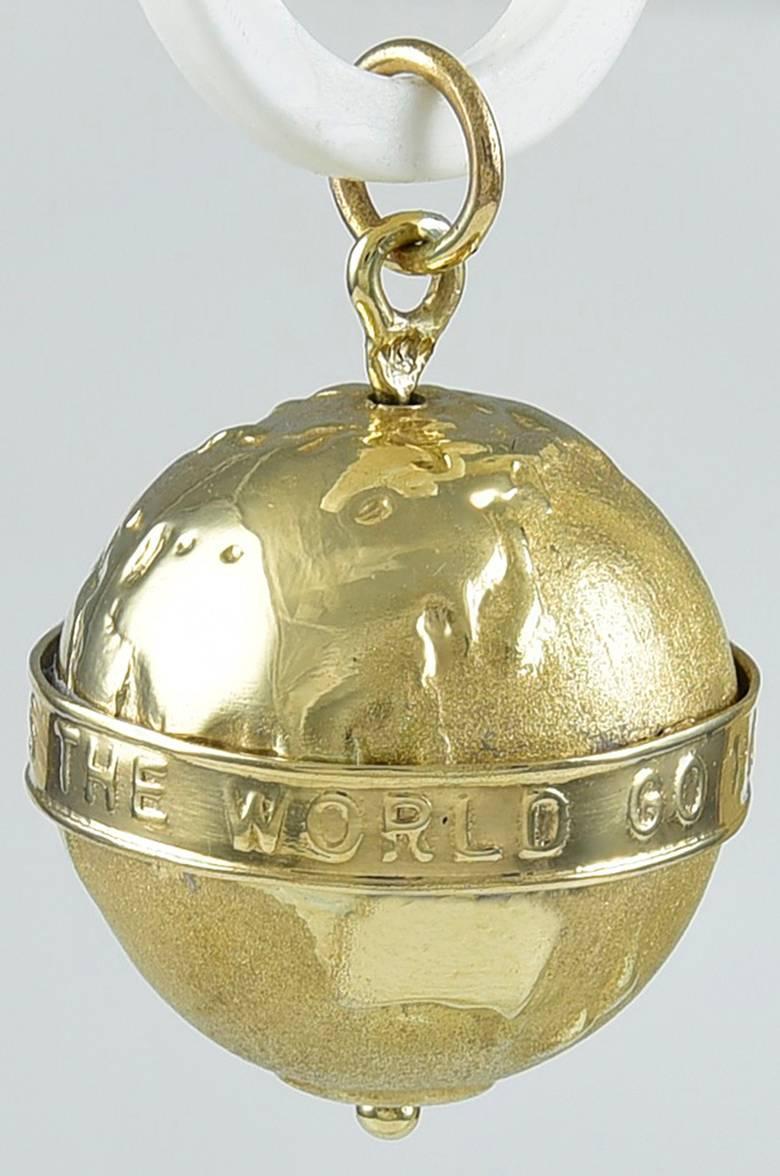 Love Makes the World Go Round Gold Globe Charm For Sale at 1stdibs