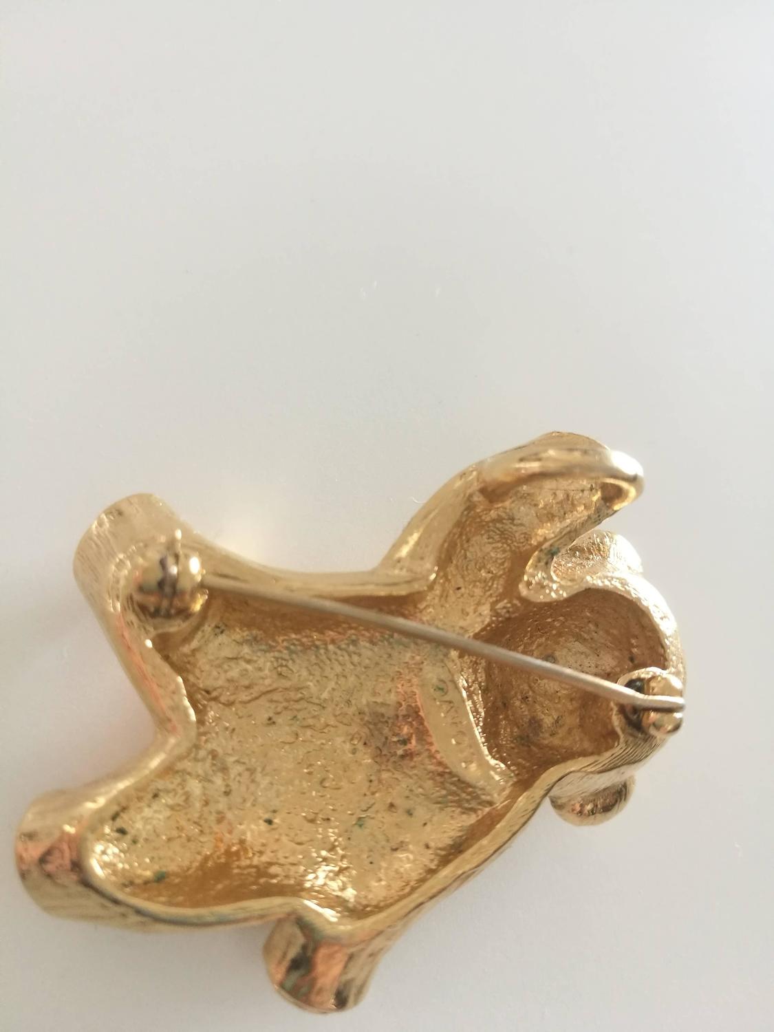 Avon Gold tone bear Brooch For Sale at 1stdibs
