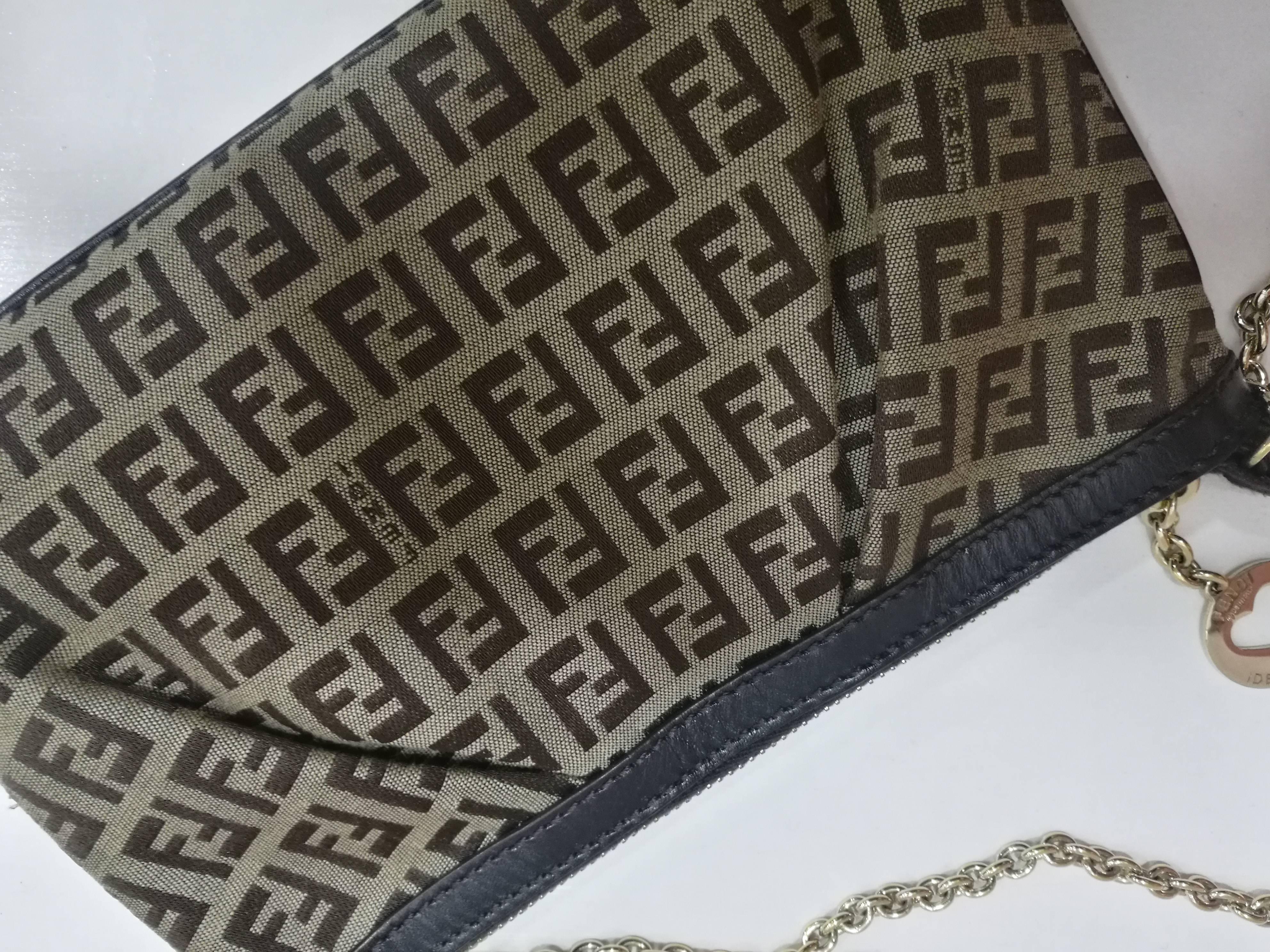 Fendi monogram pochette at 1stDibs | pochette fendi monogram, fendi ...