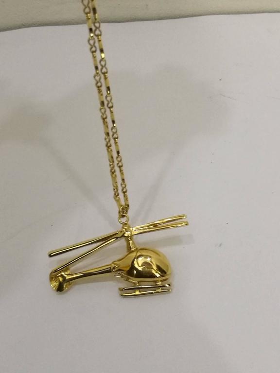 LOUIS VUITTON Helicopter Necklace Gold at 1stDibs | helicopter jewelry