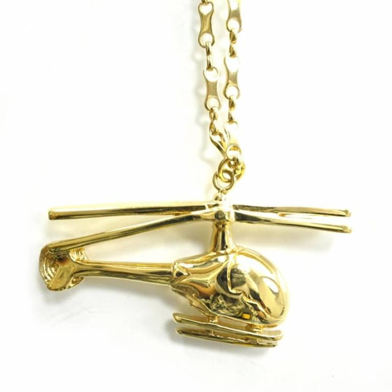 LOUIS VUITTON Helicopter Necklace Gold at 1stDibs | helicopter jewelry